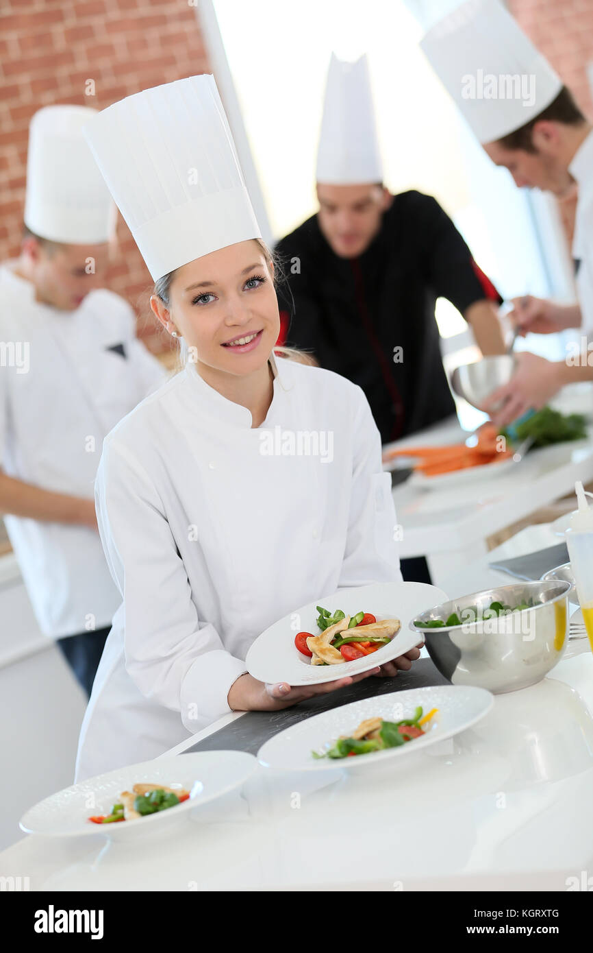 Portrait of student girl in cooking training course Stock Photo - Alamy