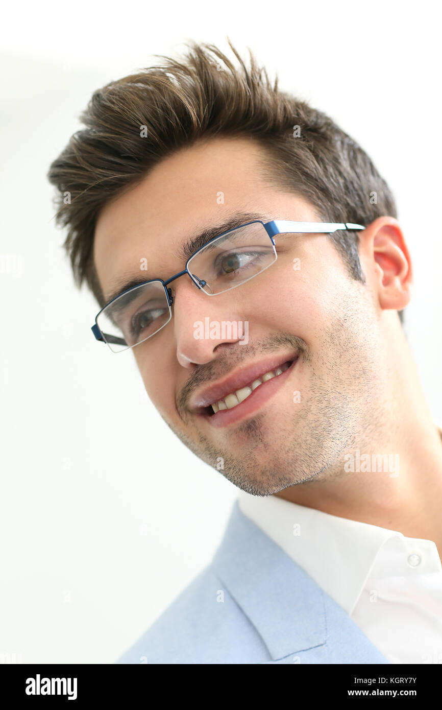 Portrait of young man wearing eyeglasses, isolated Stock Photo - Alamy