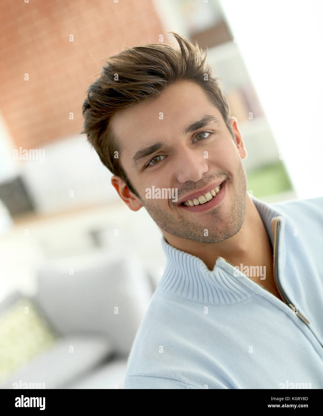 Portrait of young smiling man Stock Photo - Alamy