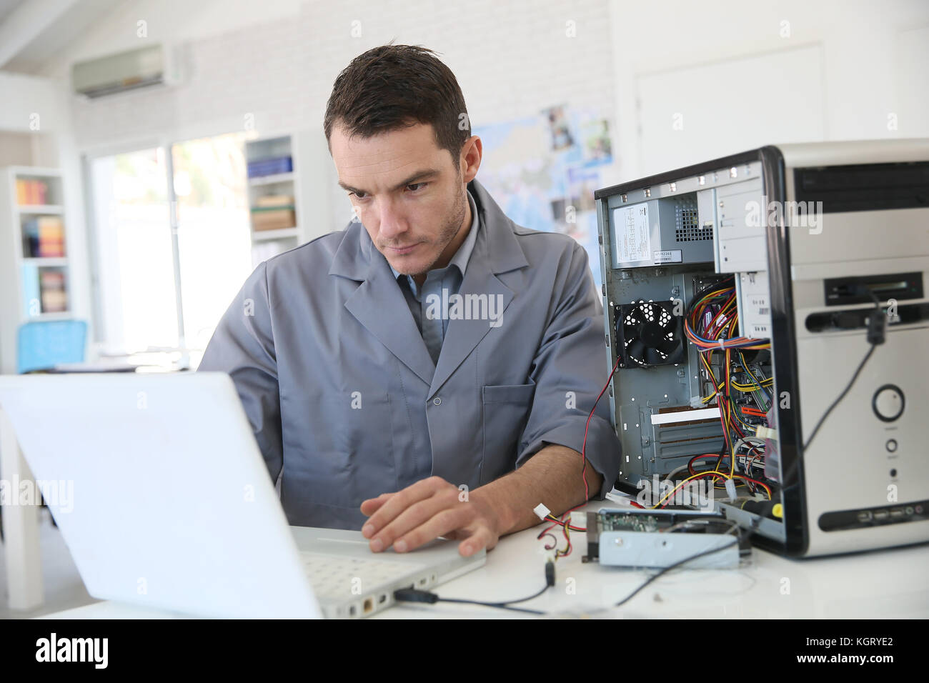 Technician fixing computer hardware Stock Photo - Alamy Technician fixing computer hardware Stock Photo - Alamy