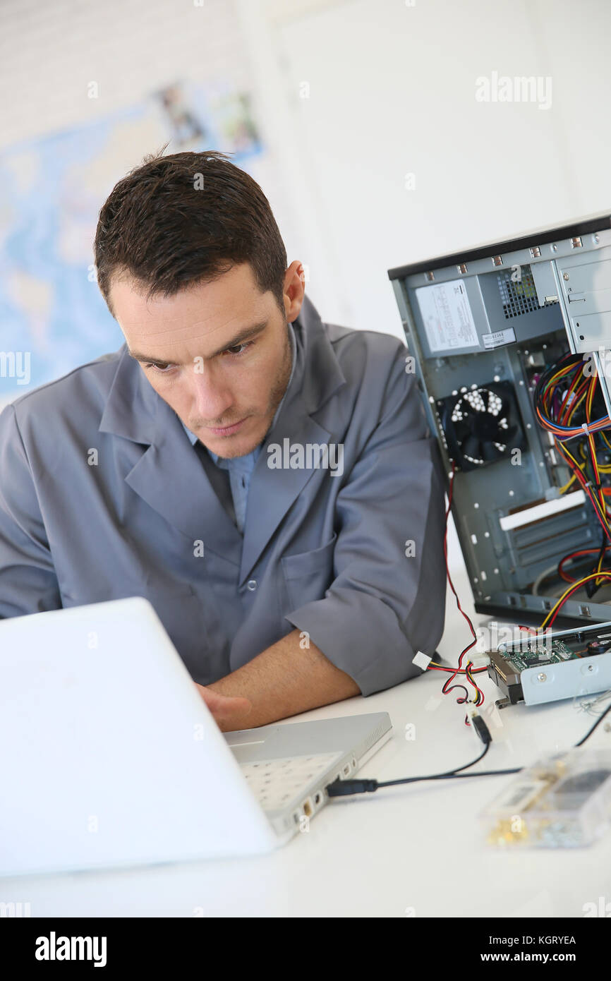 Technician fixing computer hardware Stock Photo - Alamy Technician fixing computer hardware Stock Photo - Alamy