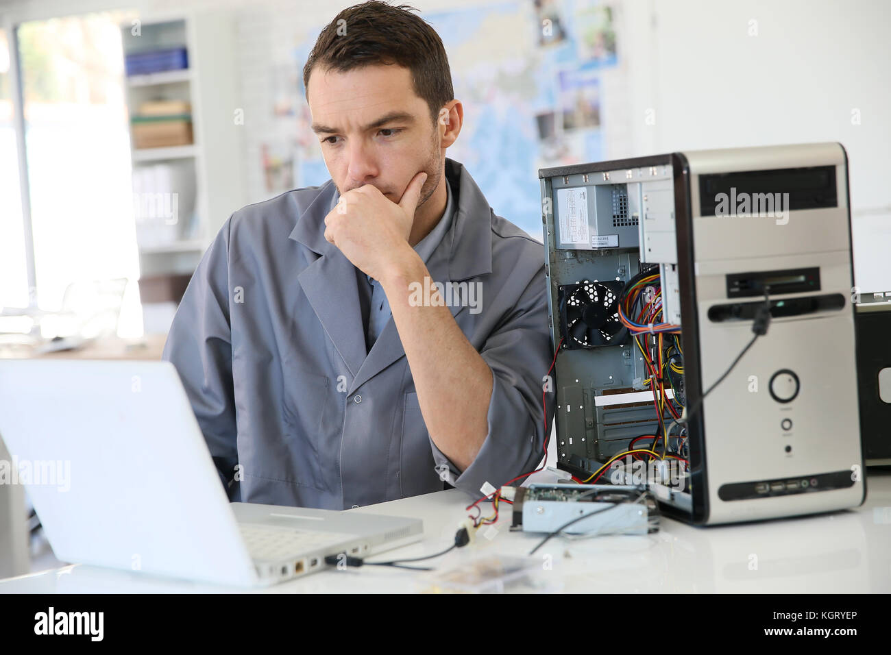 Technician fixing computer hardware Stock Photo - Alamy Technician fixing computer hardware Stock Photo - Alamy