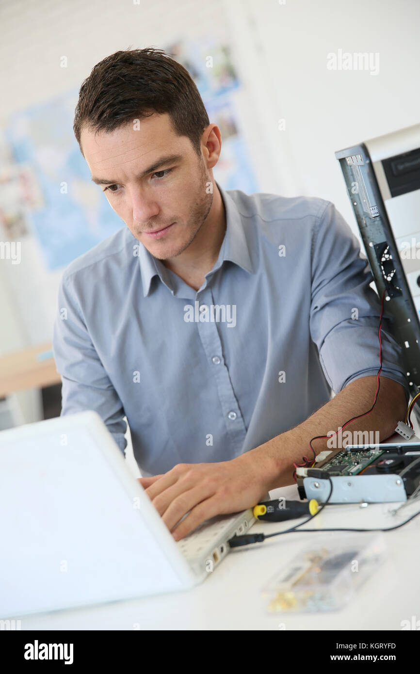Engineer proceeding to data recovery from computer Stock Photo - Alamy