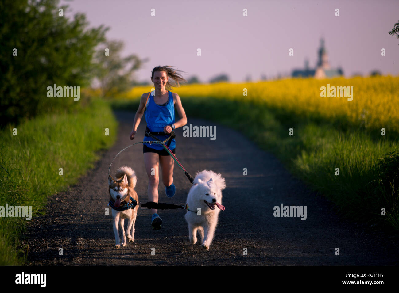Woman Running in the field Stock Photo - Alamy