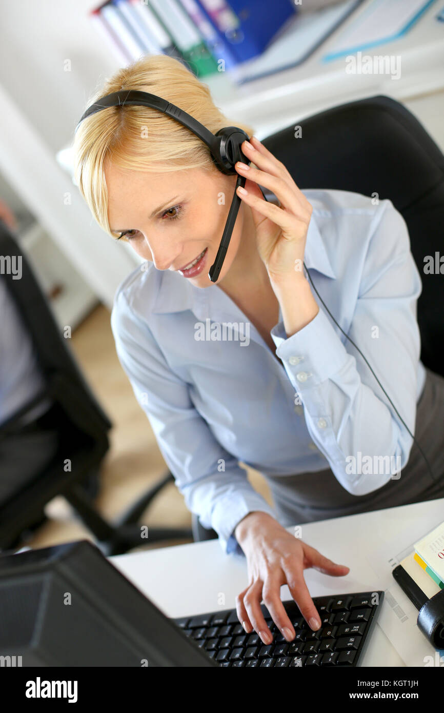 Customer service operator on the phone Stock Photo - Alamy