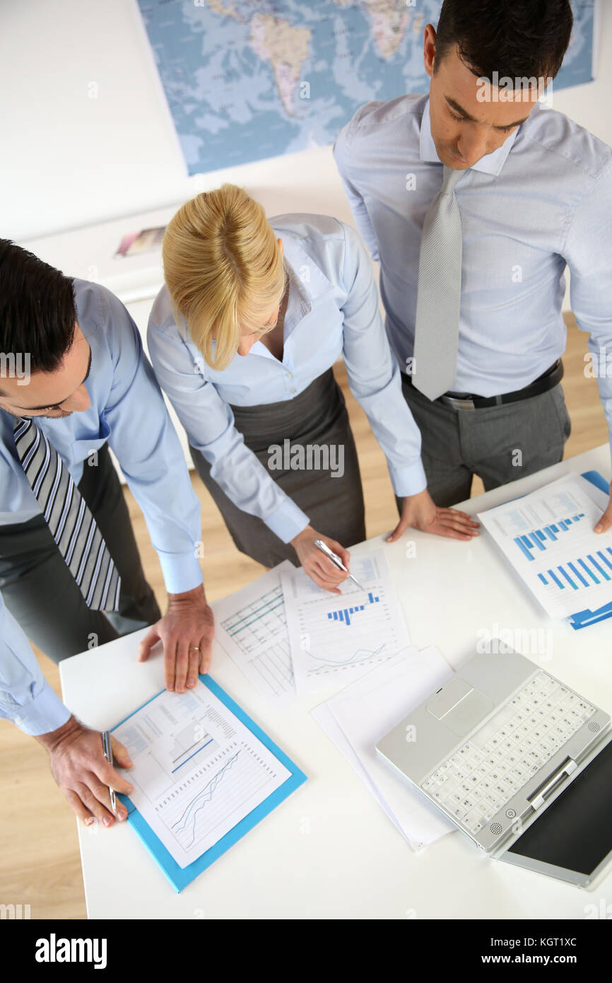 Upper view of business people working in office Stock Photo - Alamy