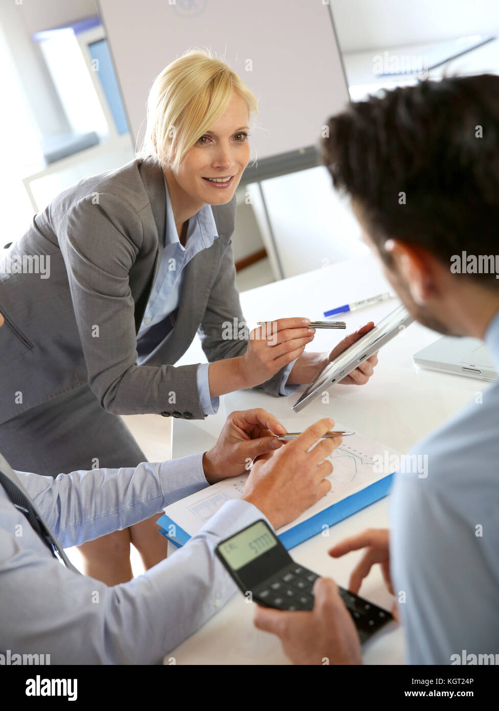 Executive woman making business presentation Stock Photo - Alamy