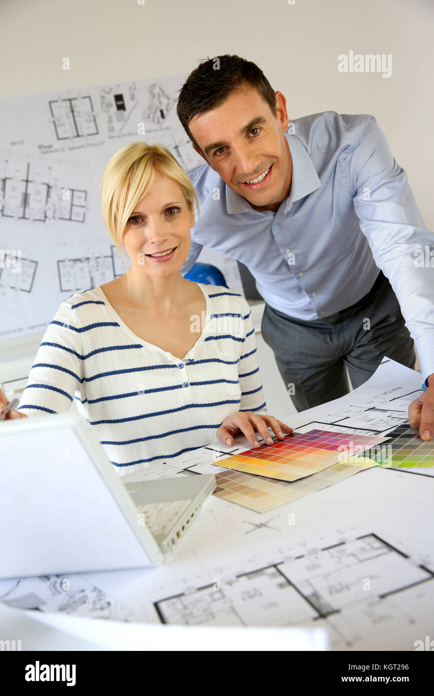 Portrait of smiling successful architects Stock Photo - Alamy