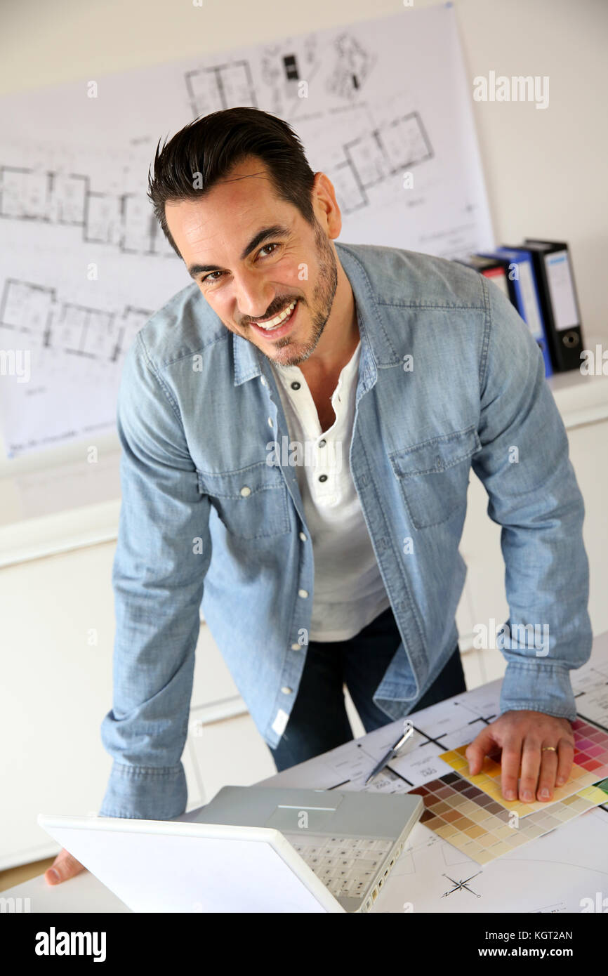 Portrait of architect working on project Stock Photo - Alamy