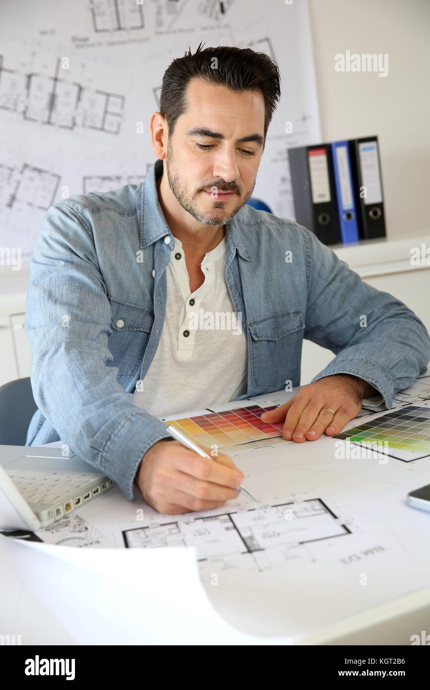 Portrait of architect working on project Stock Photo - Alamy