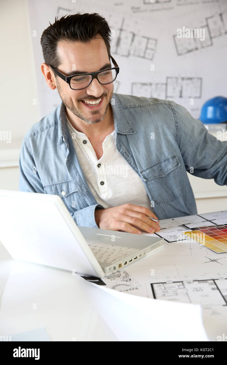 Portrait of architect working on project Stock Photo - Alamy