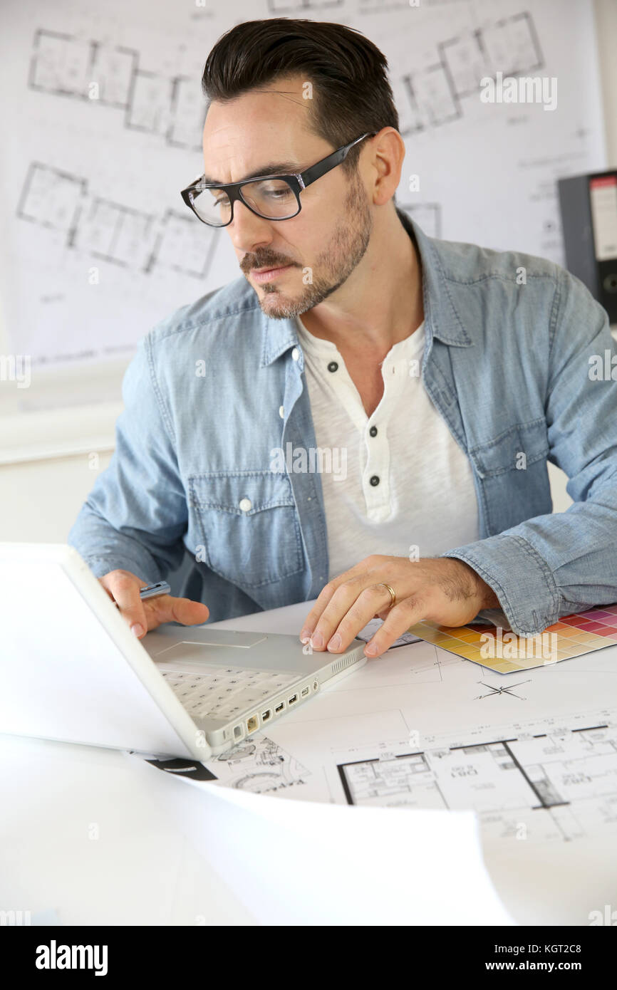 Portrait of architect working on project Stock Photo - Alamy