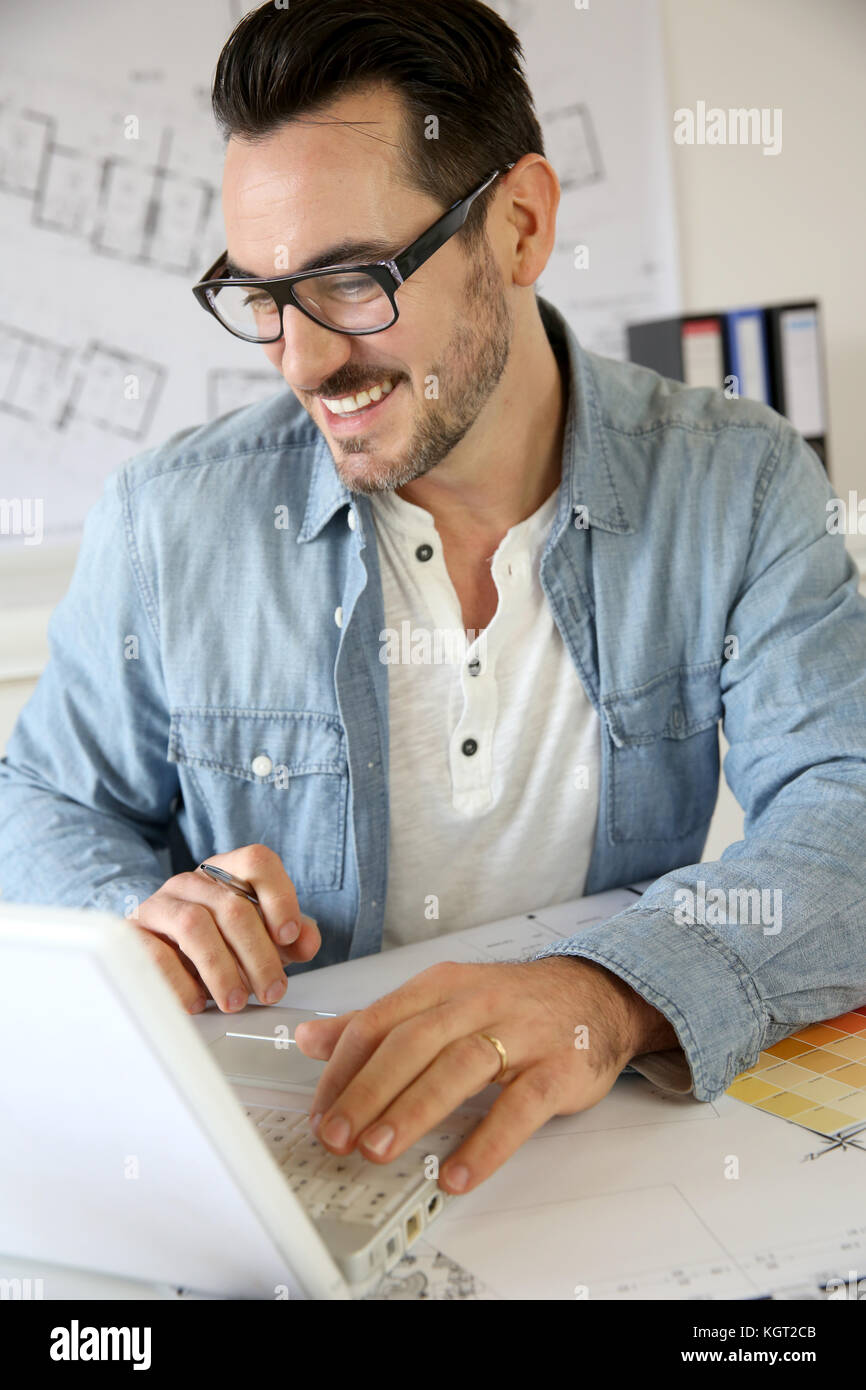 Portrait of architect working on project Stock Photo - Alamy