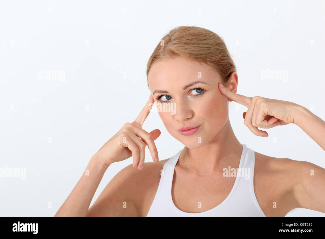 Portrait of beautiful blond woman with interrogative look Stock Photo ...