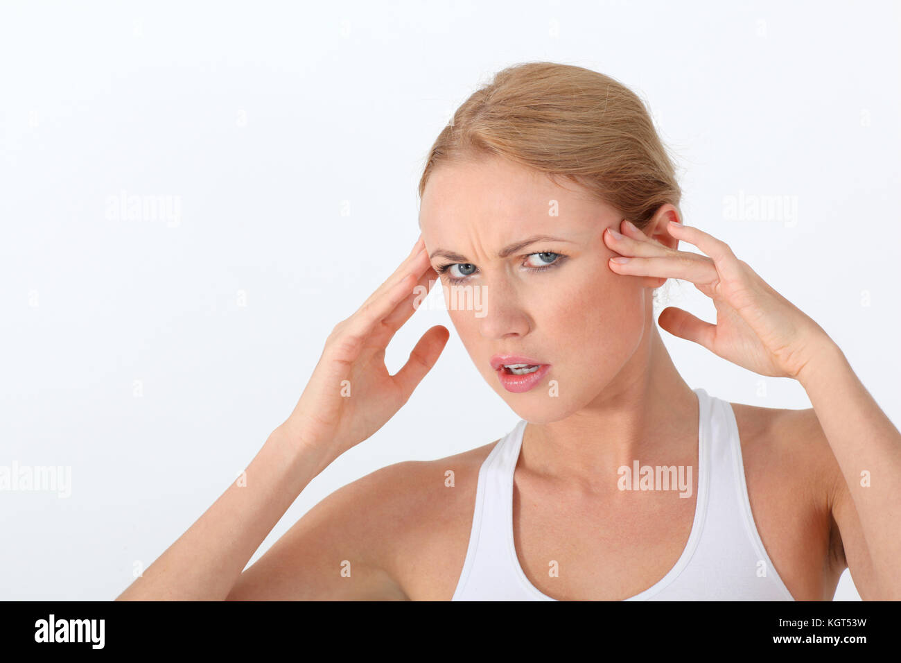 Portrait of woman having a headache Stock Photo - Alamy
