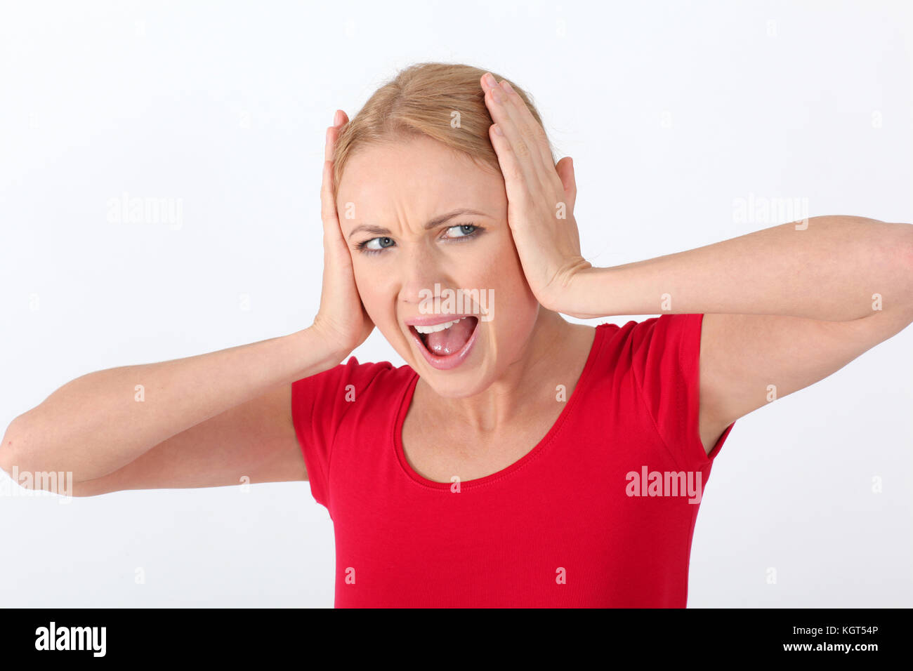 Woman in red shirt screaming Stock Photo - Alamy