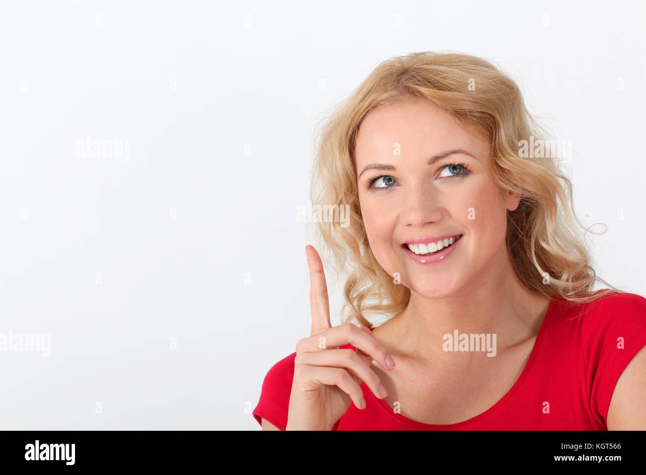 Portrait of beautiful blond woman with interrogative look Stock Photo ...