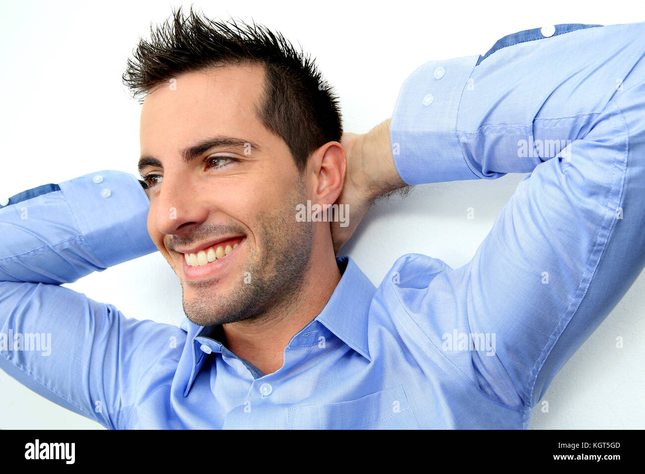 Male model arms behind head hi-res stock photography and images - Alamy