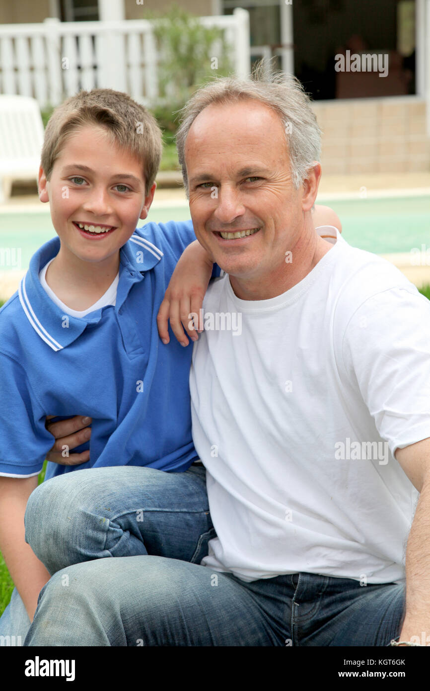 Portrait of happy father and son Stock Photo - Alamy