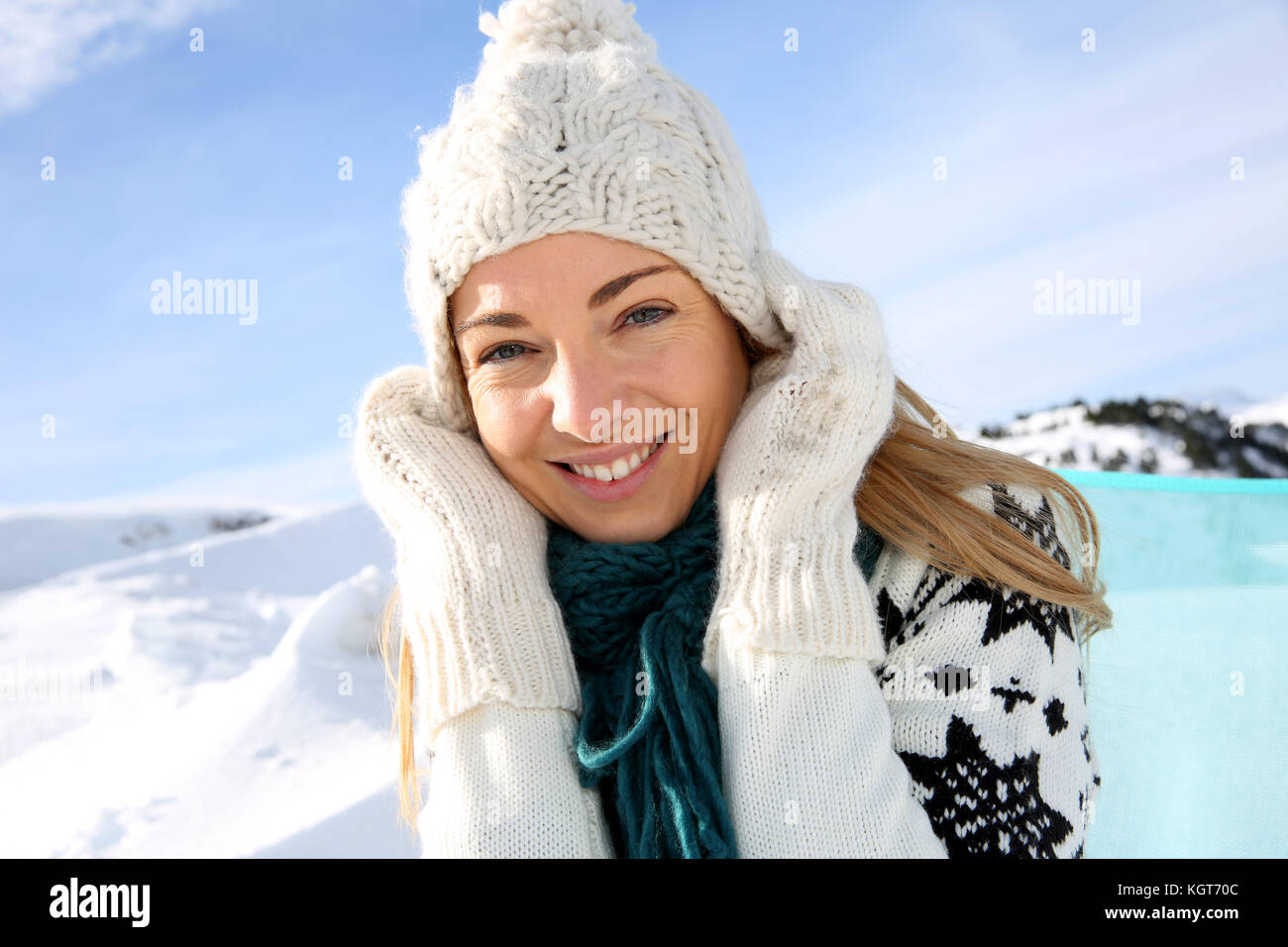 Portrait of beautiful woman in snowy mountain Stock Photo - Alamy