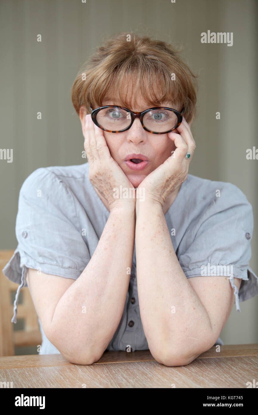 Shocked senior woman outdoors hi-res stock photography and images - Alamy
