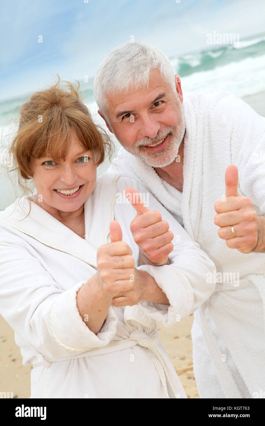 Happy senior couple on spa resort beach Stock Photo - Alamy