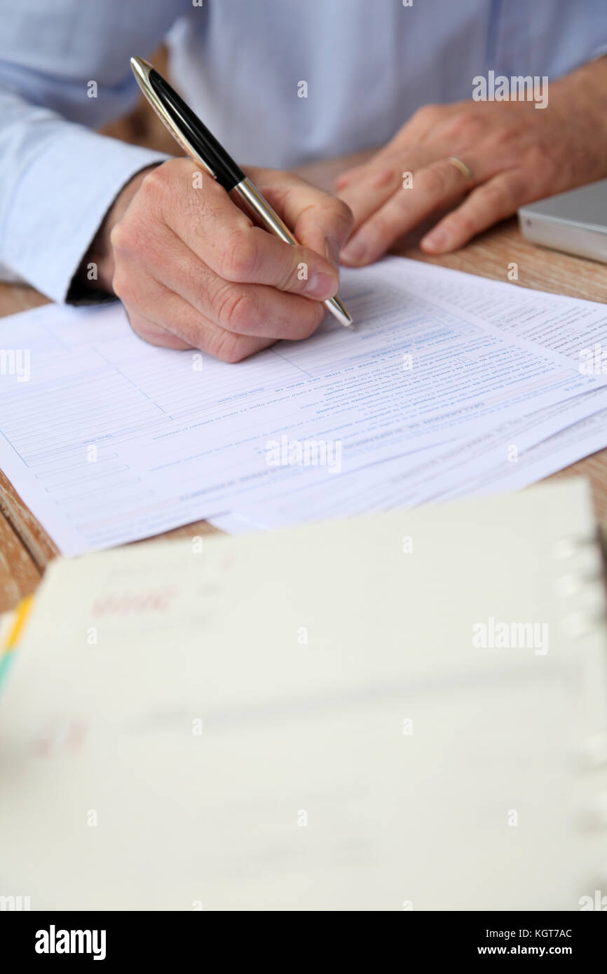 Form filling man hi-res stock photography and images - Alamy