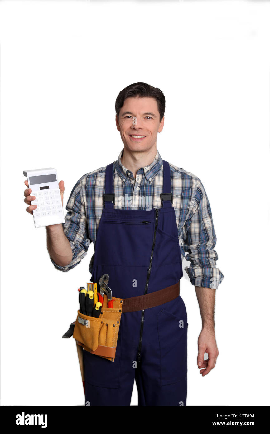 Carpenter standing on white background with calculator Stock Photo - Alamy