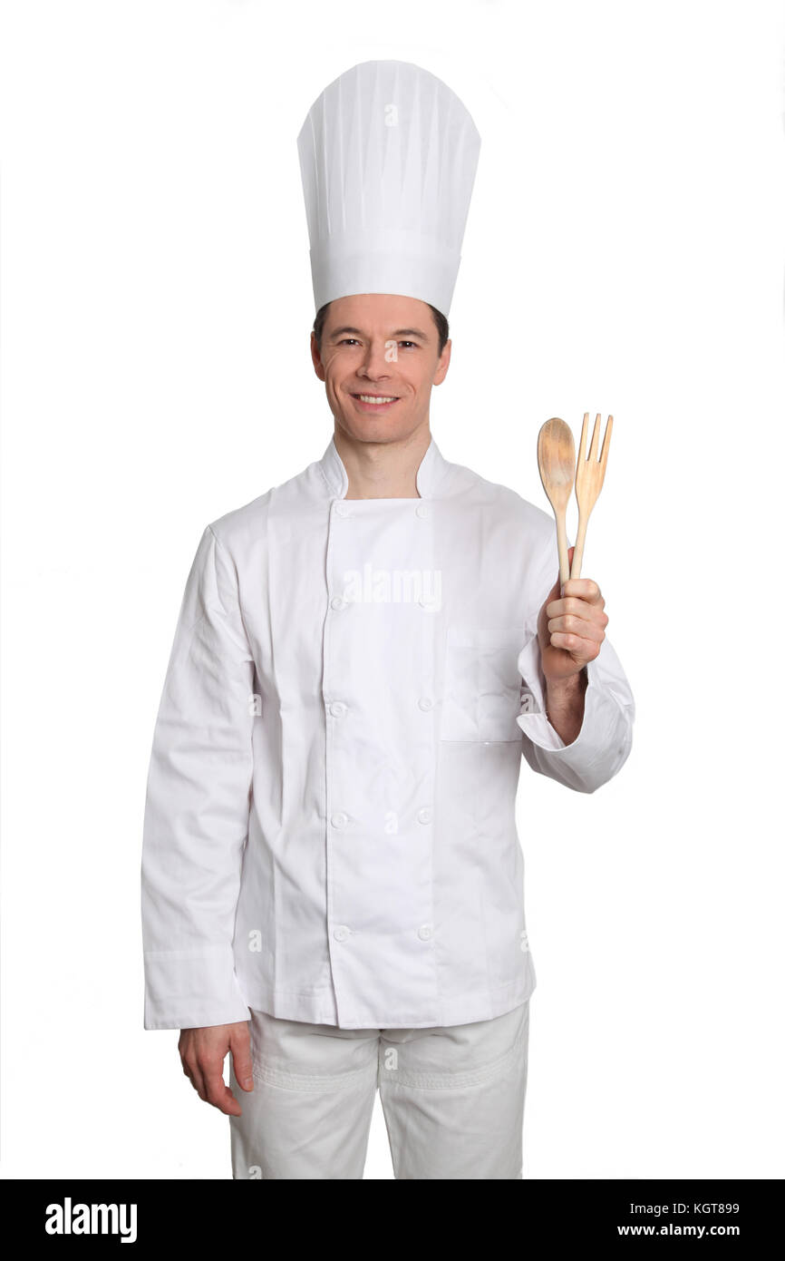 Chef standing on white background with kitchen cutlery Stock Photo - Alamy