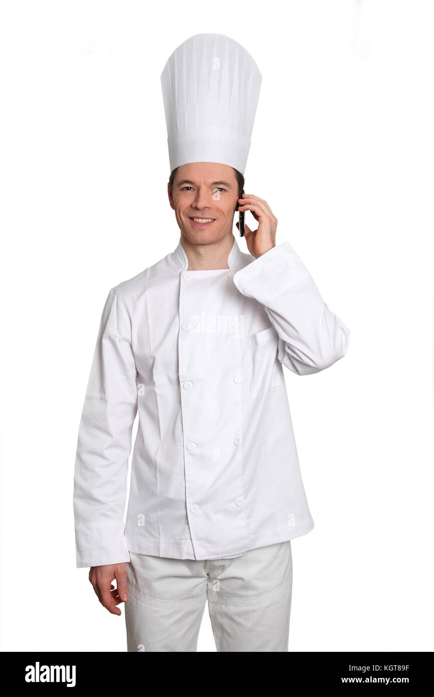 Chef standing on white background with mobile phone Stock Photo - Alamy