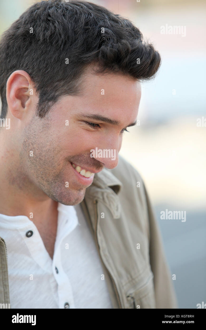 Portrait of handsome smiling man Stock Photo - Alamy