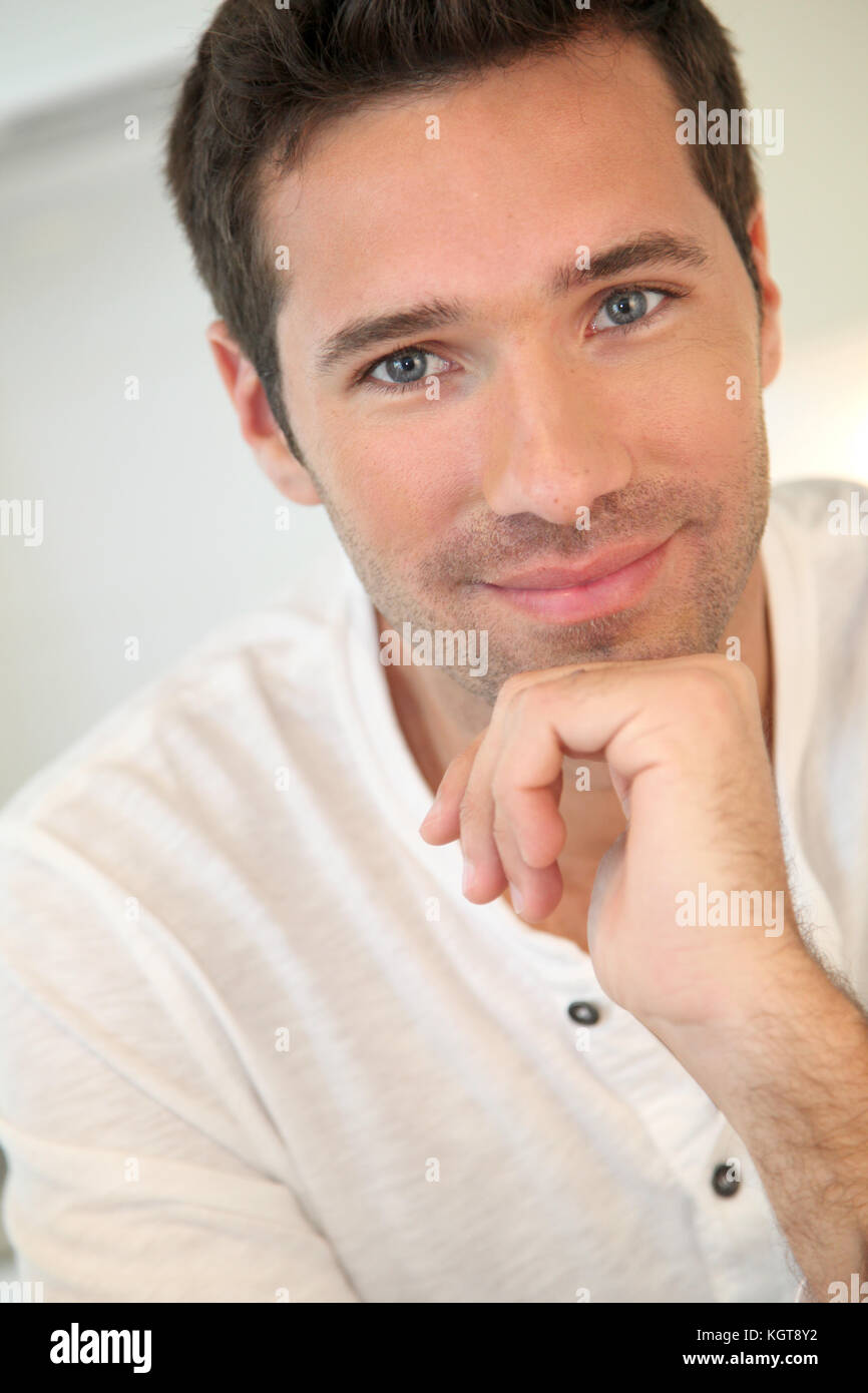 Portrait of handsome smiling man Stock Photo - Alamy