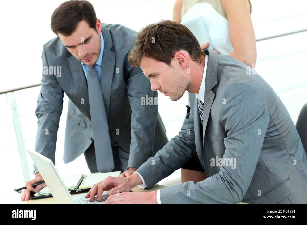 Group of business people meeting around table Stock Photo - Alamy