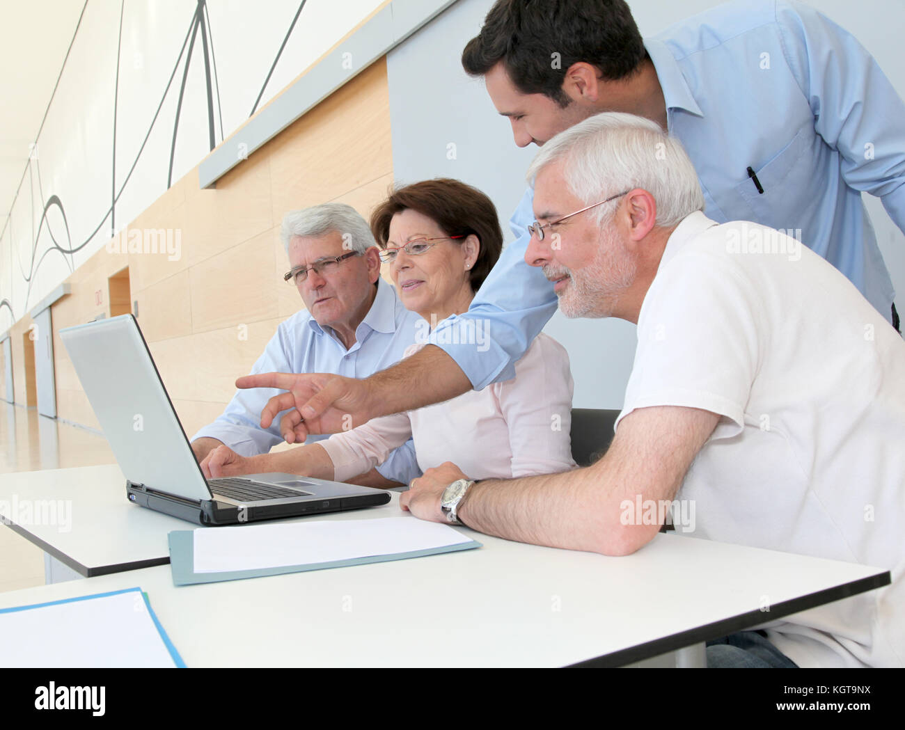 Group of senior people attending job search meeting Stock Photo - Alamy