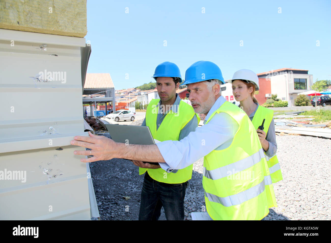 Construction workers checking drawing hi-res stock photography and ...