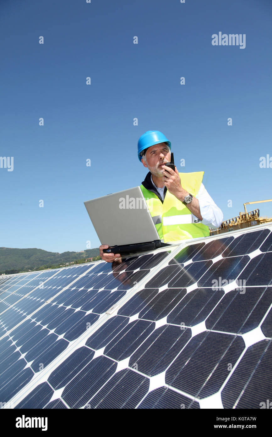 Engineer checking photovoltaic installation Stock Photo - Alamy