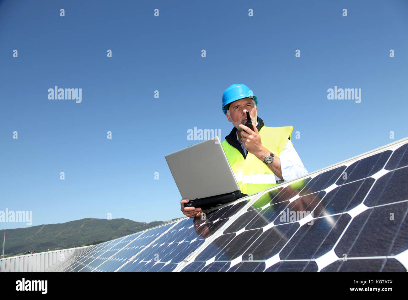 Engineer checking photovoltaic installation Stock Photo - Alamy
