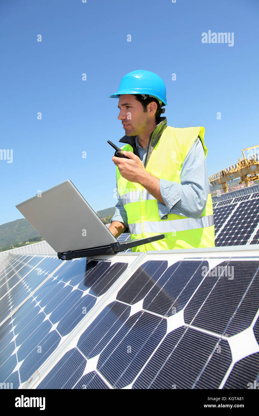 Engineer checking photovoltaic installation Stock Photo - Alamy