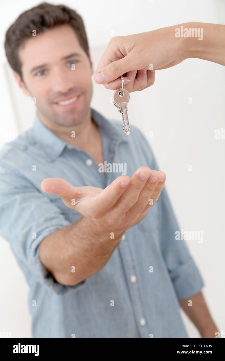 Man getting keys of new house Stock Photo - Alamy