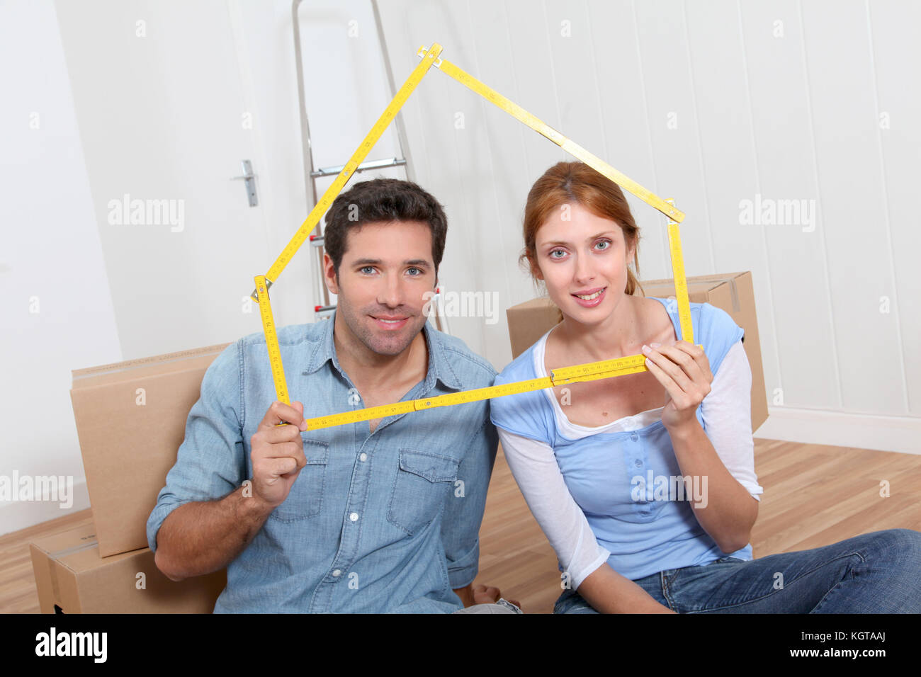 Young couple buying new home Stock Photo - Alamy