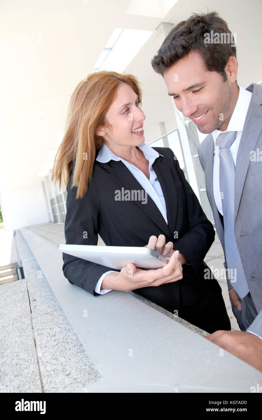 Business team meeting outside the airport Stock Photo - Alamy
