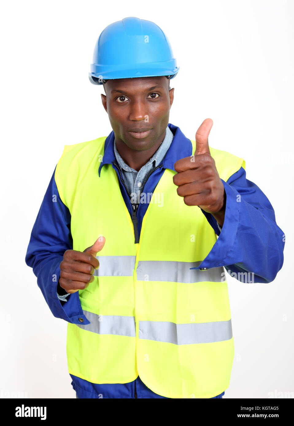 Construction worker showing thumb up Stock Photo - Alamy