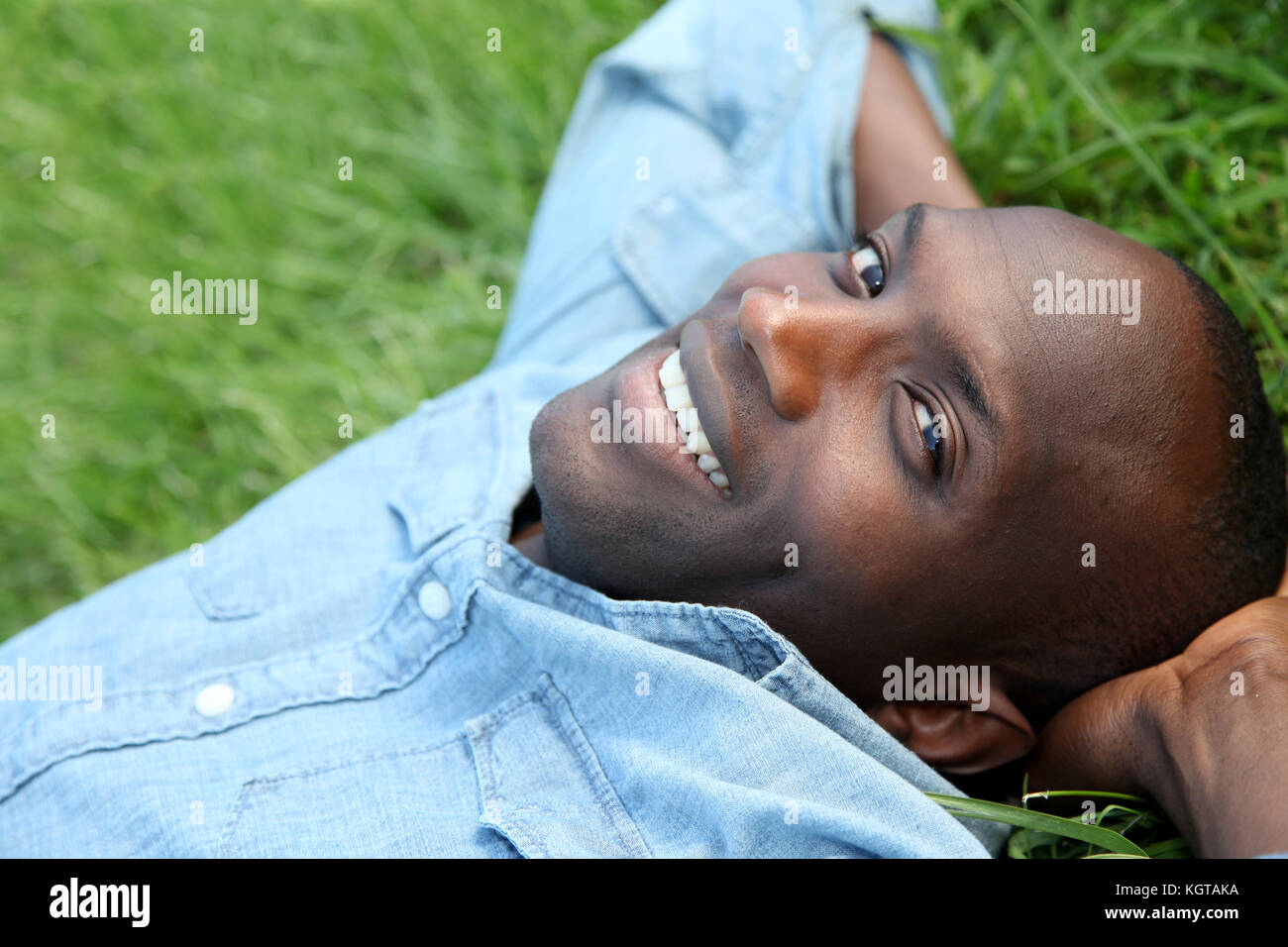 Man taking a nap in park Stock Photo - Alamy