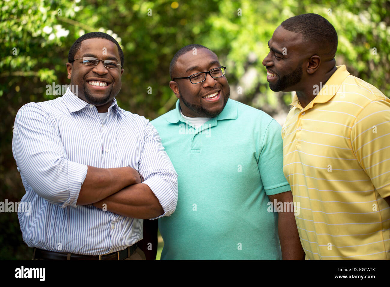 Brothers laughing and talking Stock Photo - Alamy