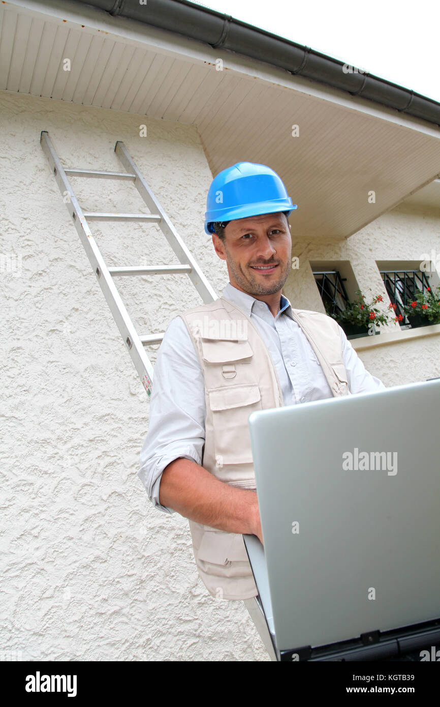 Entrepreneur using laptop computer Stock Photo - Alamy
