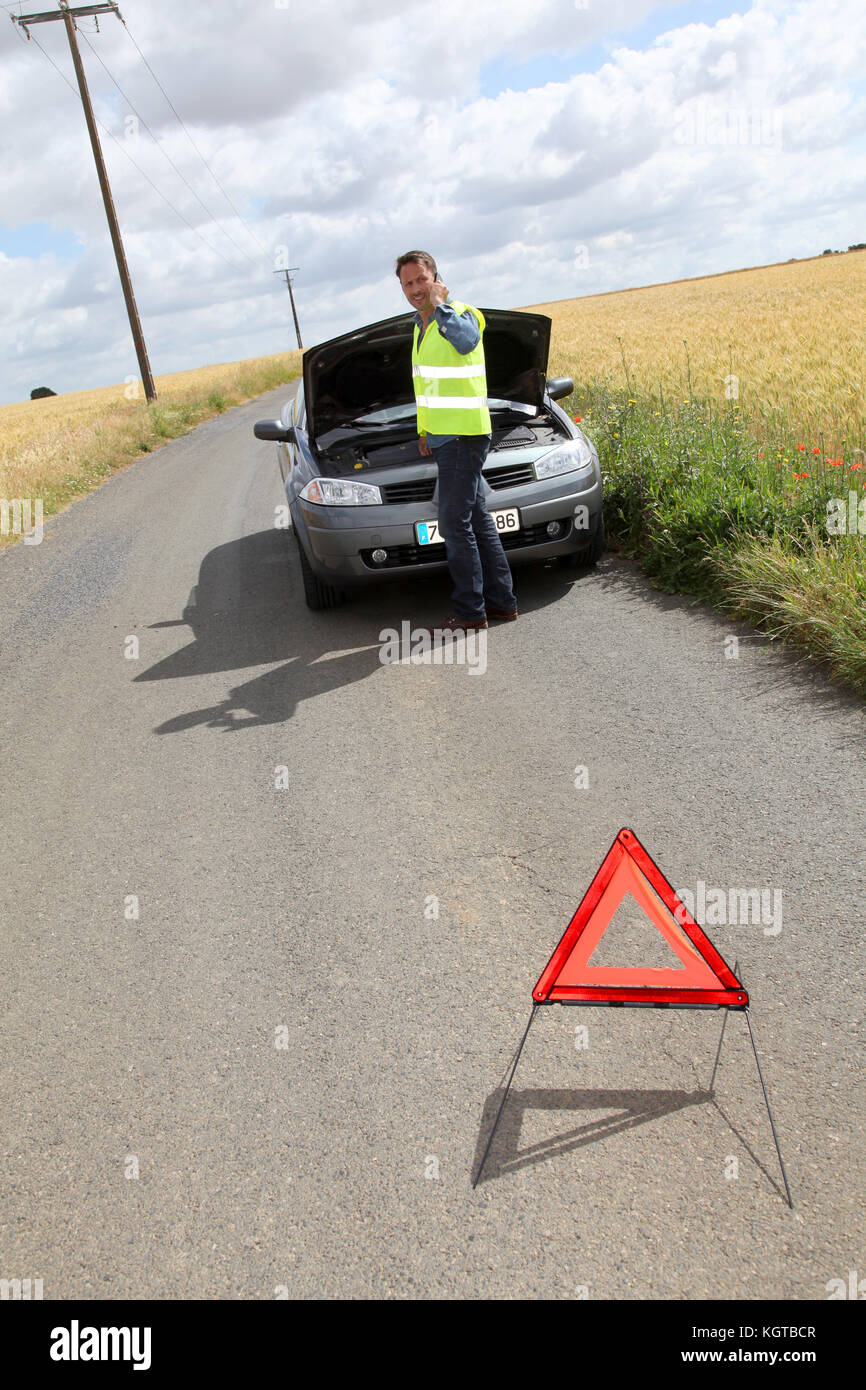 Man on the road with car breakdown Stock Photo - Alamy