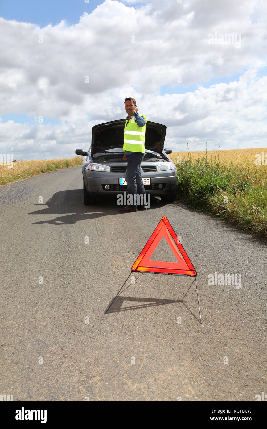 Man on the road with car breakdown Stock Photo - Alamy