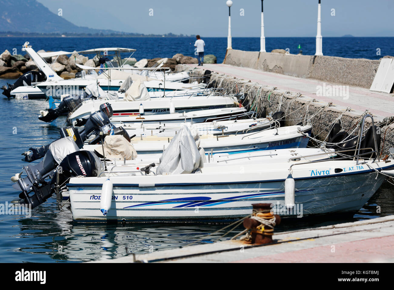 Boats and sea blue and white Stock Photo - Alamy