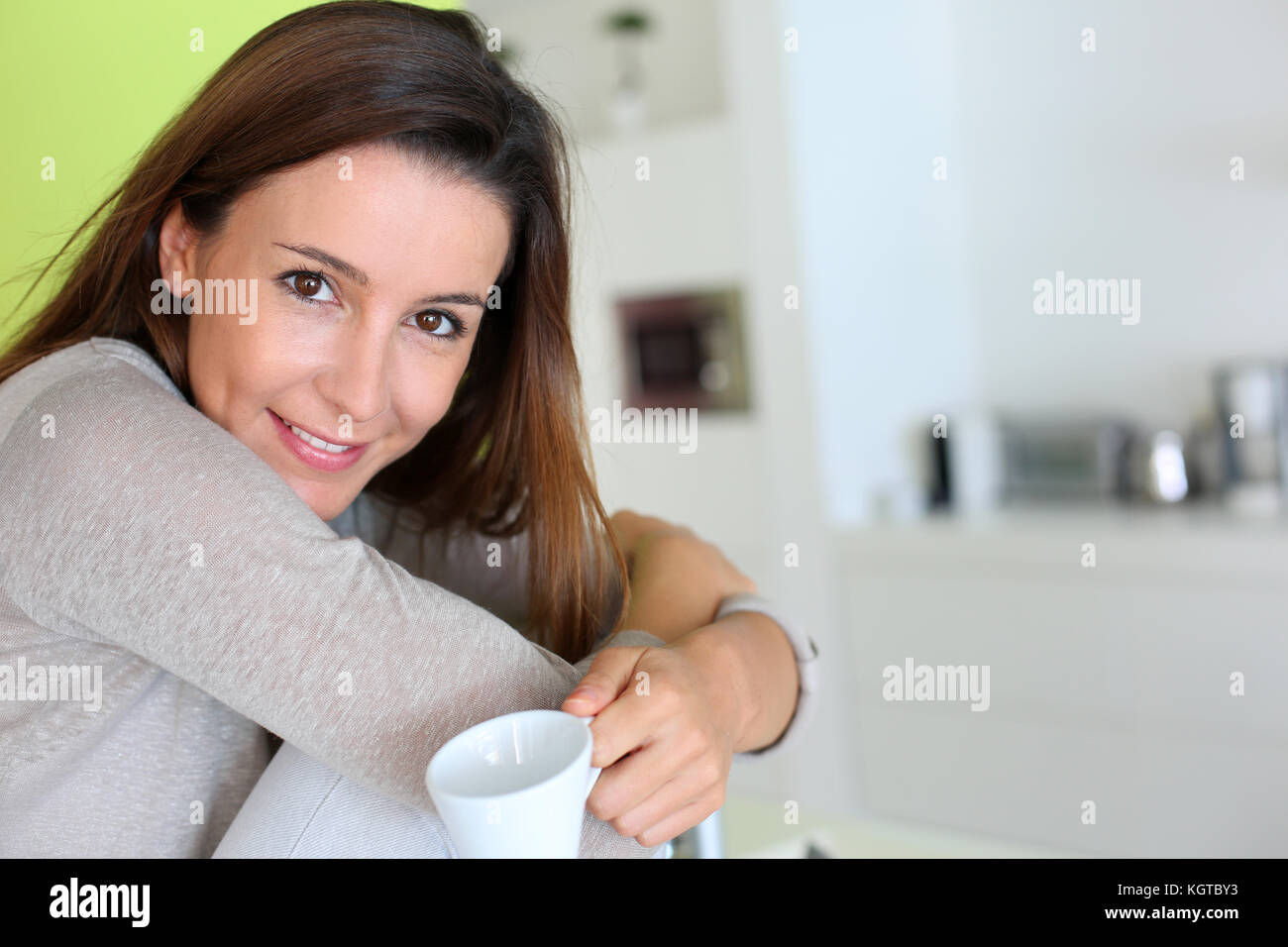 Smiling woman with happy look on her face Stock Photo - Alamy