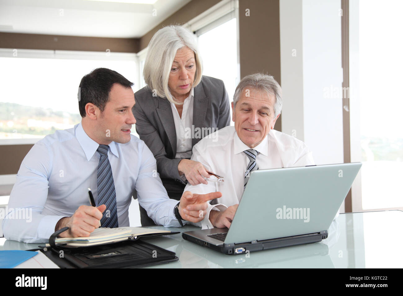 Sales people in work meeting Stock Photo - Alamy